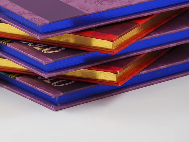 Ventajas de imprimir un libro con los cantos pintados